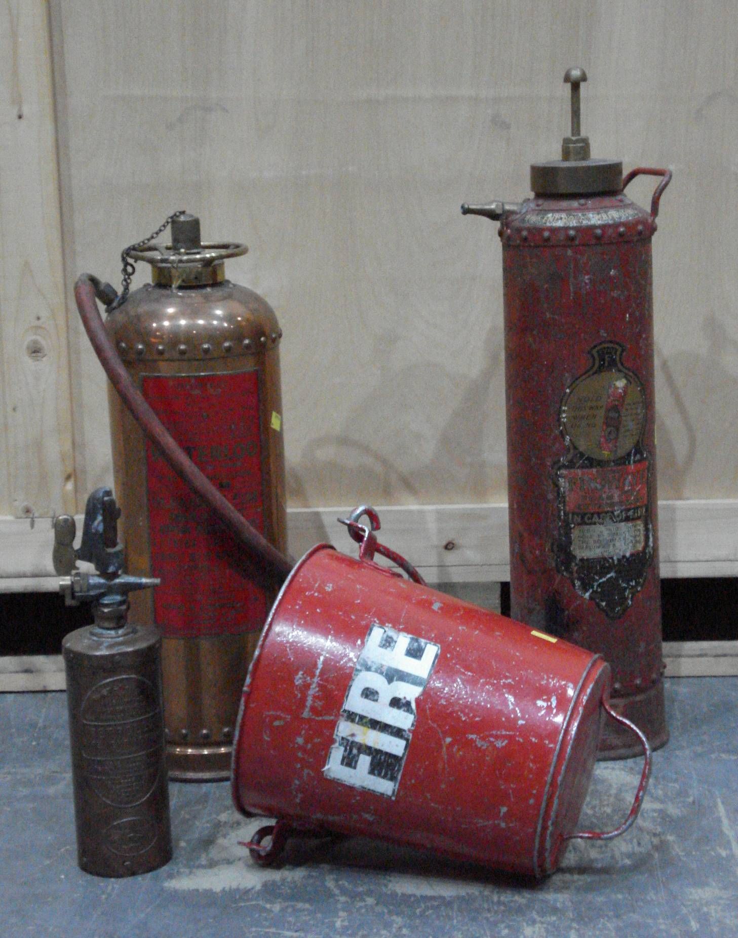 Bonhams Cars : Three fire extinguishers,