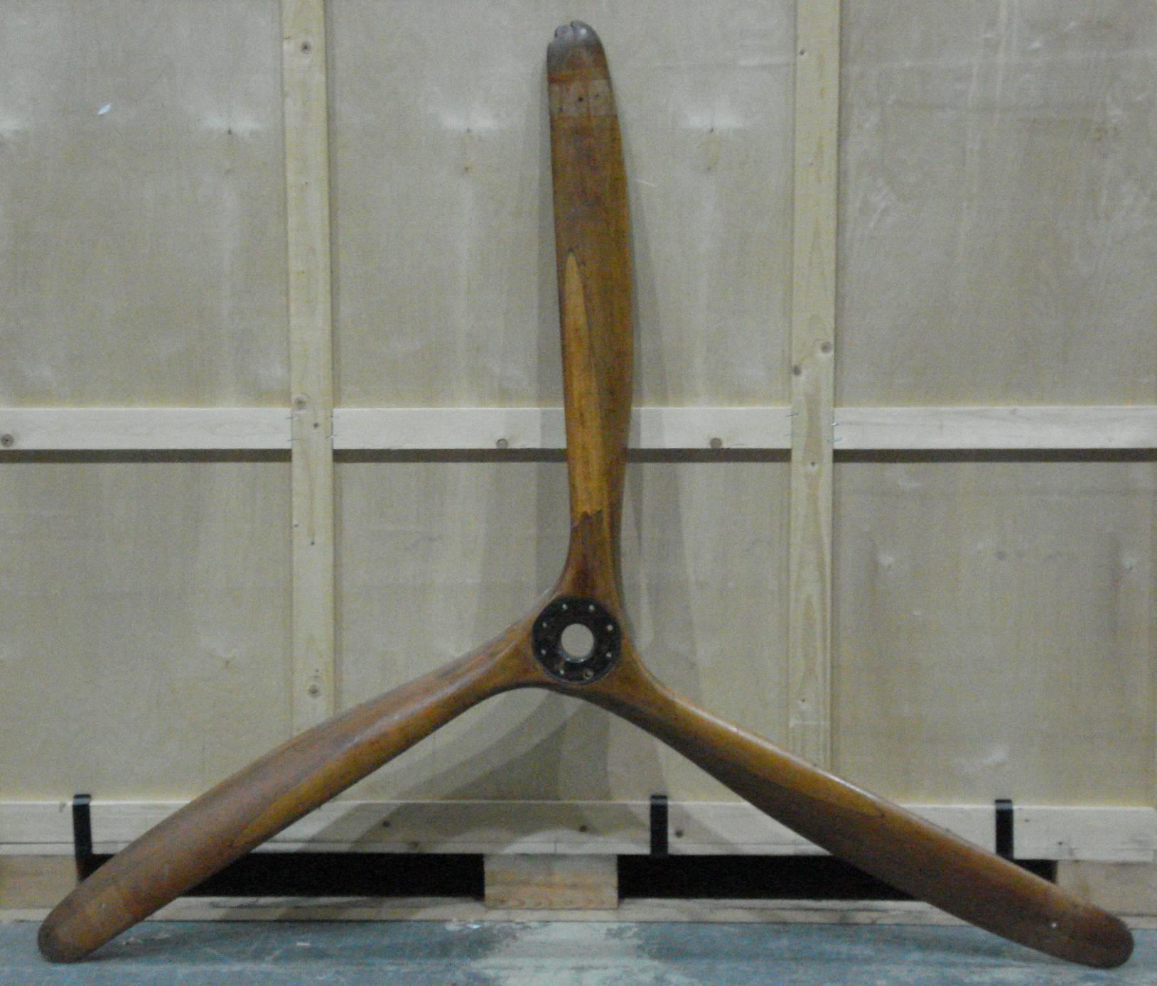 Bonhams Cars A Three Bladed Wooden Aircraft Propeller