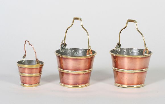 Bonhams : An unusual graduated set of three miniature polished copper ...