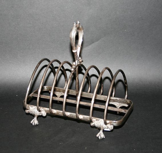 Bonhams : A late Victorian cast silver toastrack Sheffield 1898