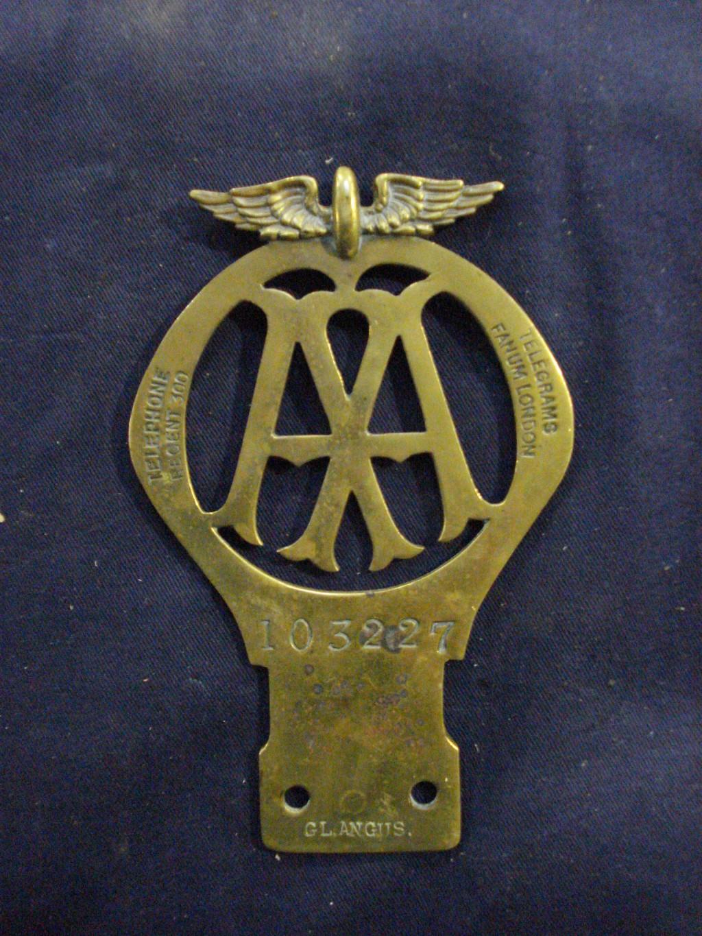 Bonhams Cars : A brass AA car badge, 1913,