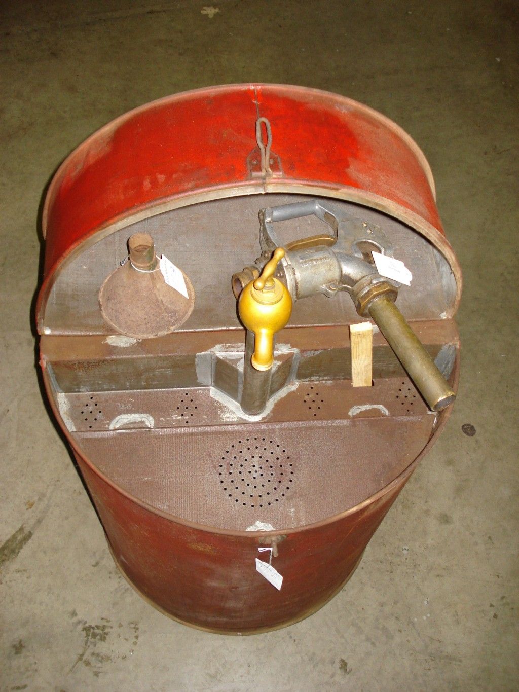 Bonhams Cars : A 40 gallon oil cabinet,