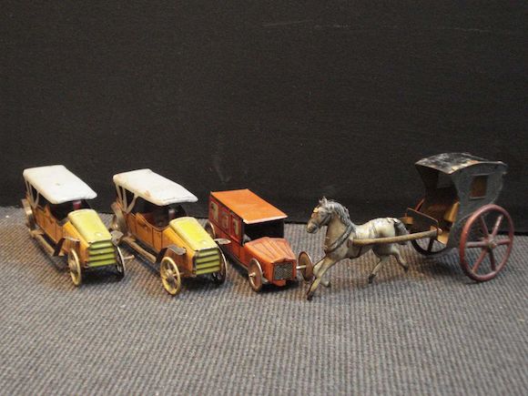 Bonhams : Four tinplate penny toys 4
