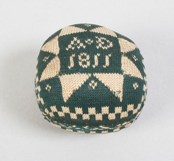 Bonhams : An initialled and dated knitted pin ball
