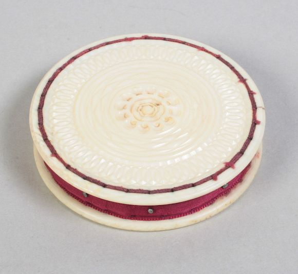 Bonhams : A very large ivory disc form pincushion