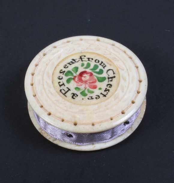 Bonhams : An ivory disc form pincushion