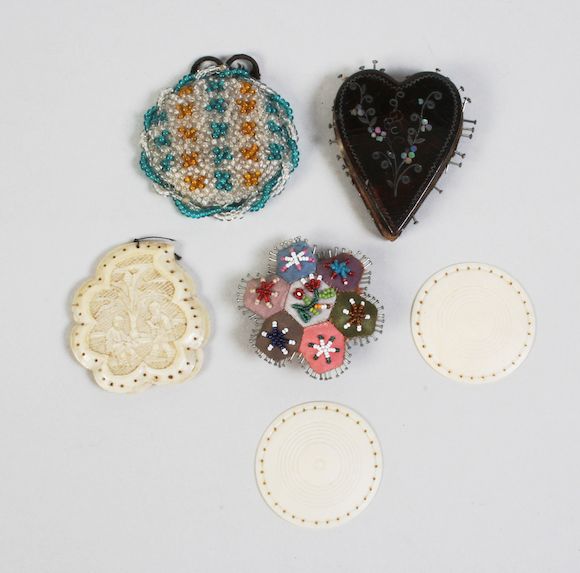 Bonhams : A hexafoil patchwork and beadwork pincushion edged with pins ...