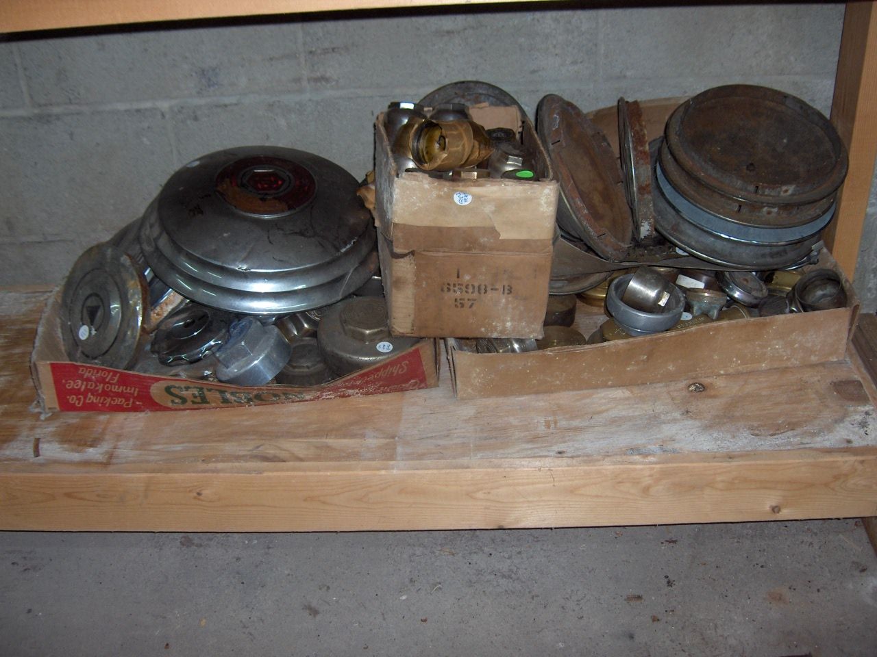 Bonhams Cars : A collection of hub caps,,