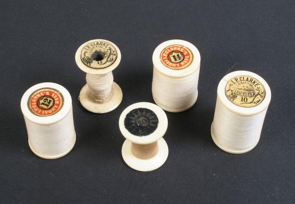 Bonhams : Five early bone and ivory reels