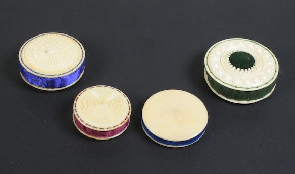Bonhams : Four ivory disc form pincushions