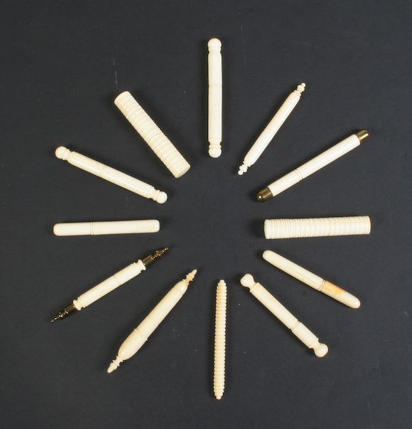 Bonhams : Twelve various ivory and bone cylinder needlecases