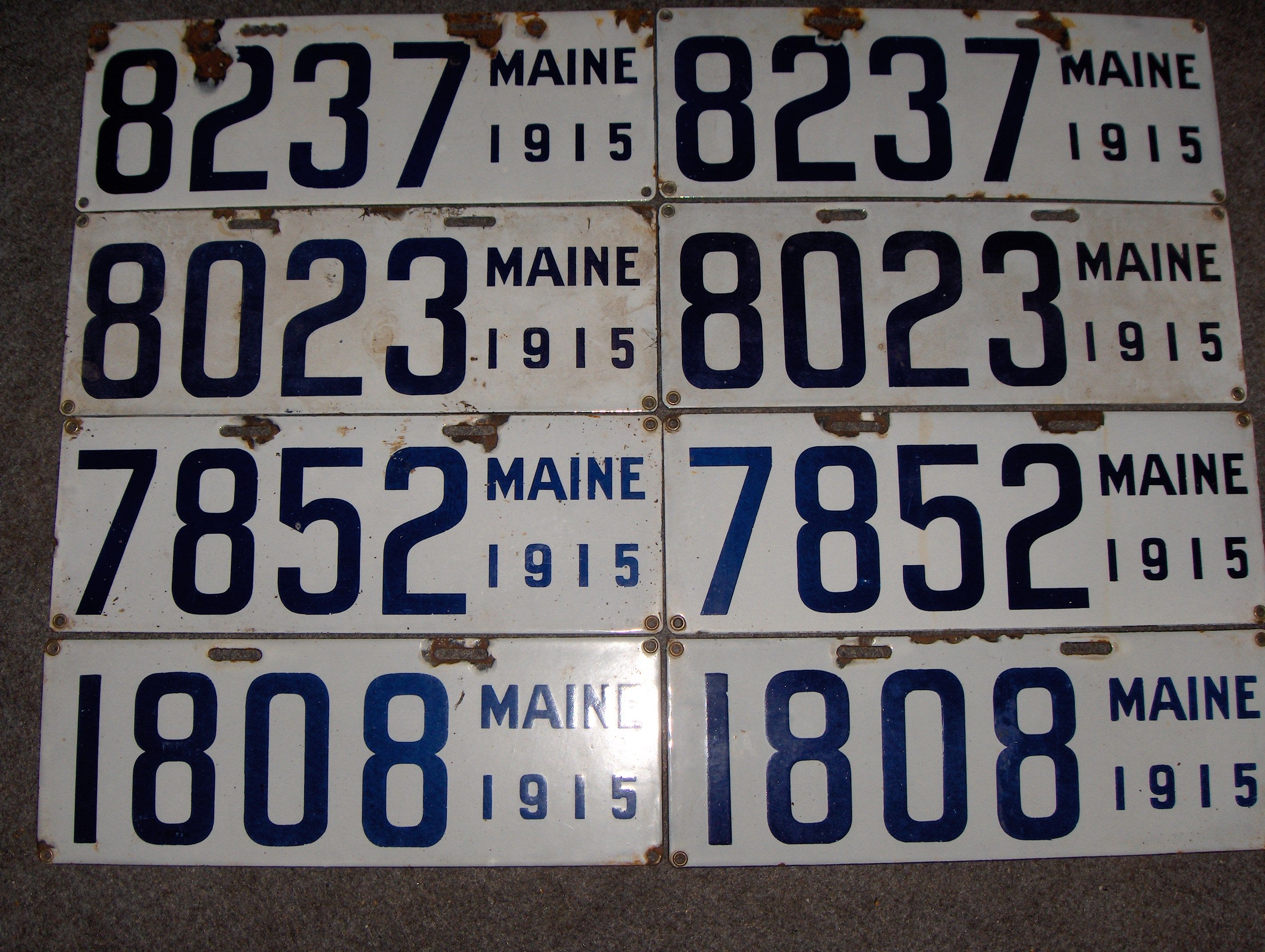 Bonhams Cars : Four pairs of 1915 porcelain enamel Maine license plates,,