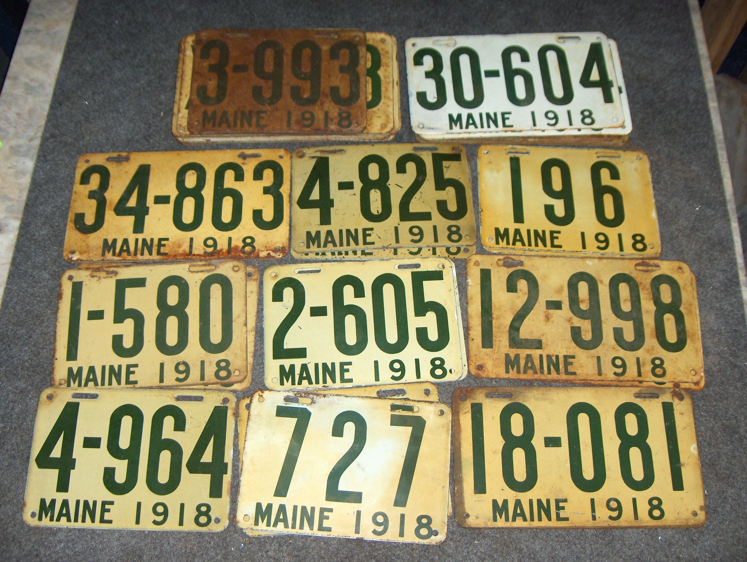 Bonhams Cars : Fifty-four assorted 1918 tin Maine license plates,,
