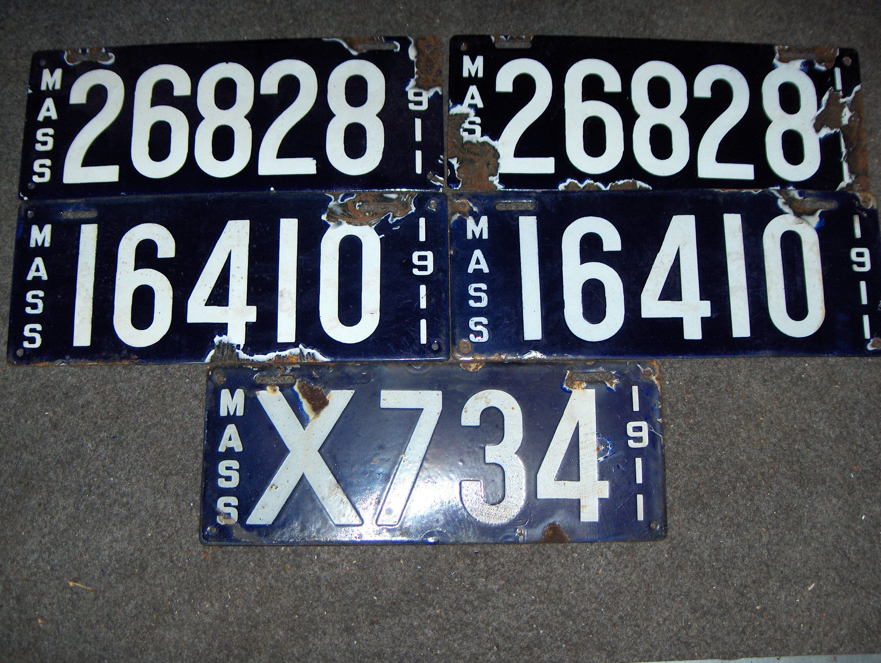 Bonhams Cars : Five 1911 porcelain enamel Massachusetts license plates,,