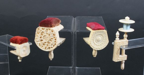 Bonhams : Four Chinese carved ivory sewing clamps