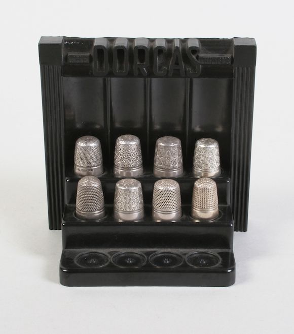 Bonhams : Eight various thimbles and a rare plastic Odeonesque Dorcas ...