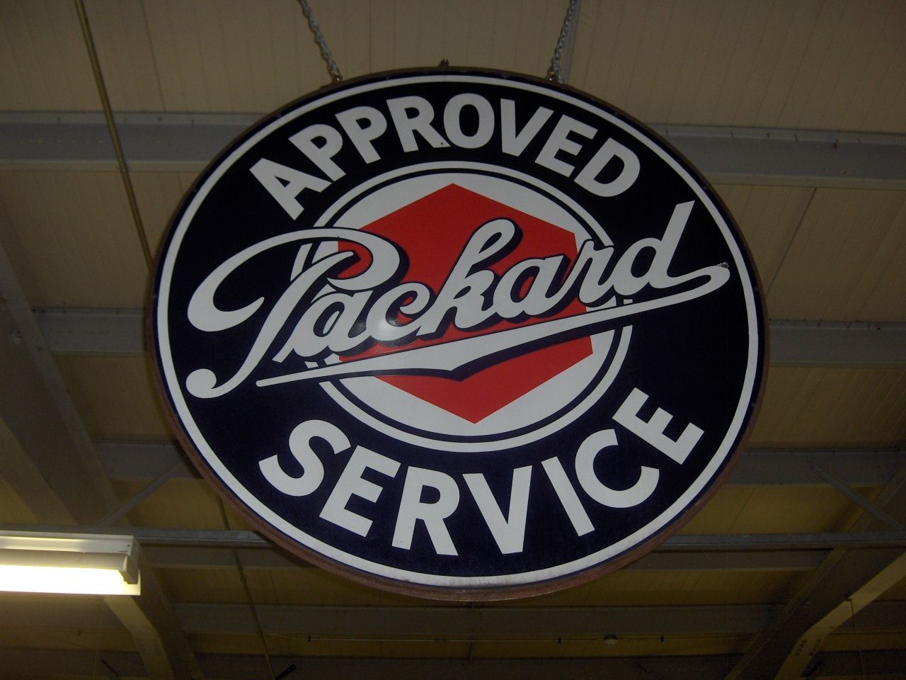 Bonhams Cars : An Approved Packard Service enamel sign,,