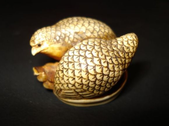Bonhams : A stained ivory netsuke of two game-birds; inscribed Okatomo