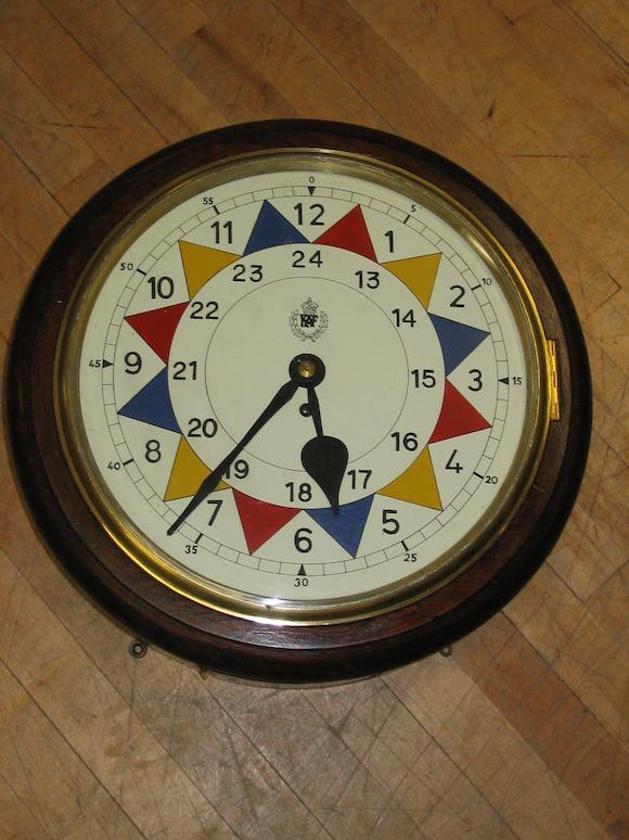 Bonhams : An RAF 24 hour sector wall clock 19in(48cm)diam.