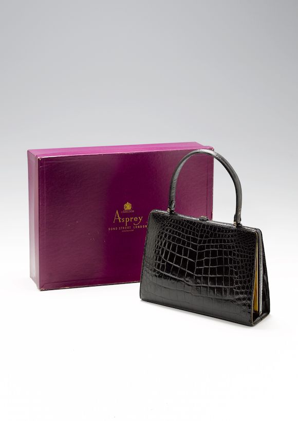 Bonhams : A black crocodile lady's handbag,purchased from Asprey,
