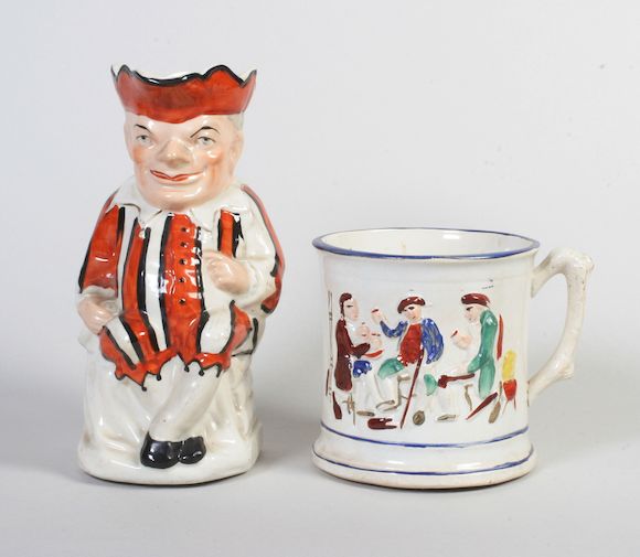 Bonhams : A Staffordshire Toby jug 'Mr Punch' and a mug 20th Century