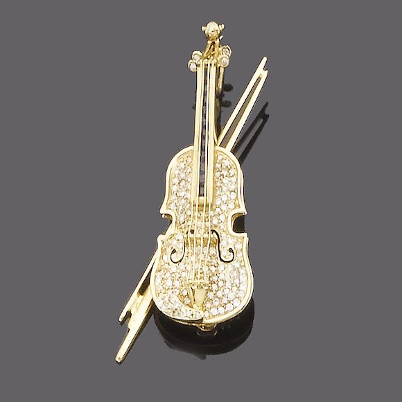 Bonhams : A diamond and sapphire violin brooch/pendant