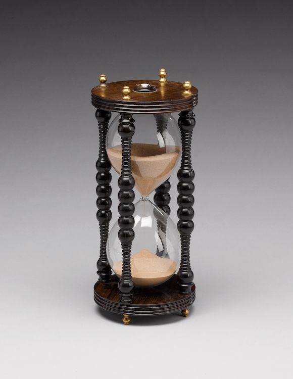 Bonhams : A large solid ebony turned hour glass, 20th century