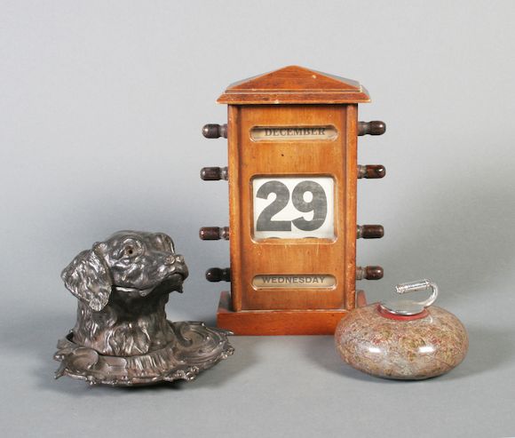 Bonhams : A 19th century German cast-iron inkwell, a curling stone ...