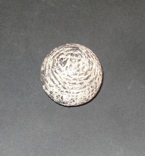 Bonhams : A hand cut gutty ball in the Forgan pattern circa 1860s