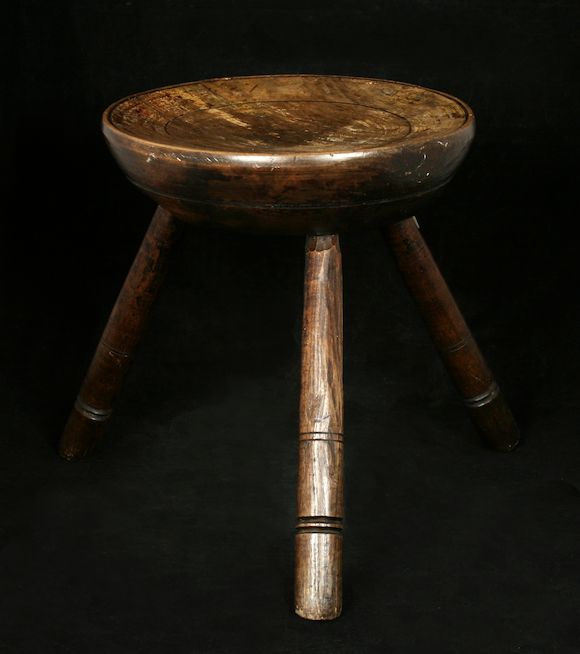 Bonhams : A 19th century ash and sycamore milking stool