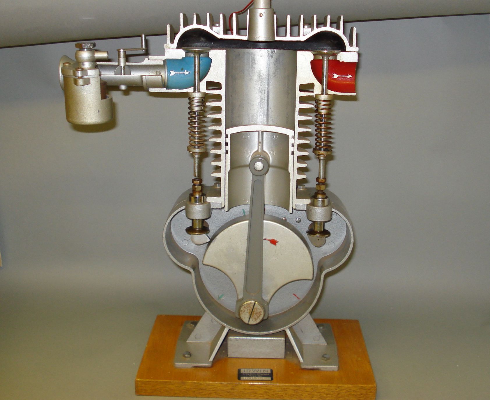 Bonhams Cars : A cutaway model of a four stroke twin-cam engine,