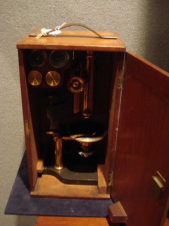 Bonhams : A Watson petrological compound monocular microscope, English,