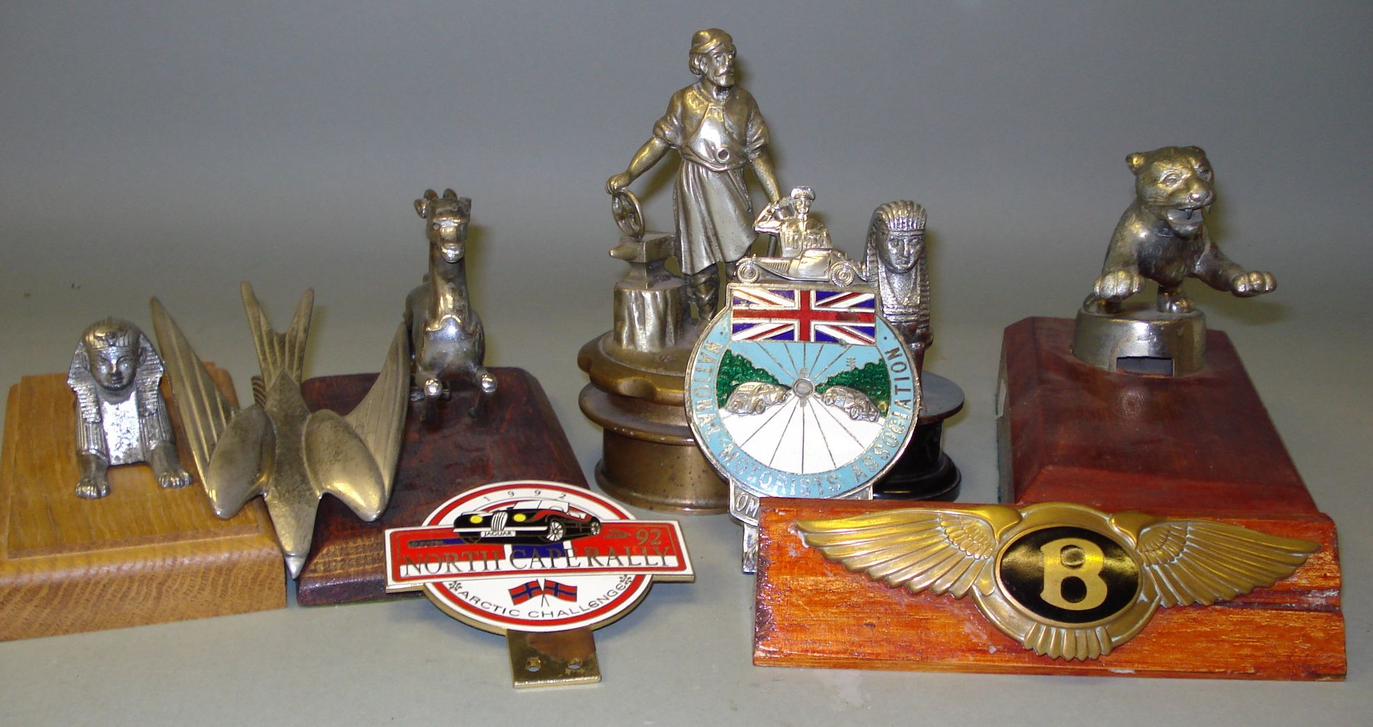 Bonhams Cars : A good lot of mascots and badges,