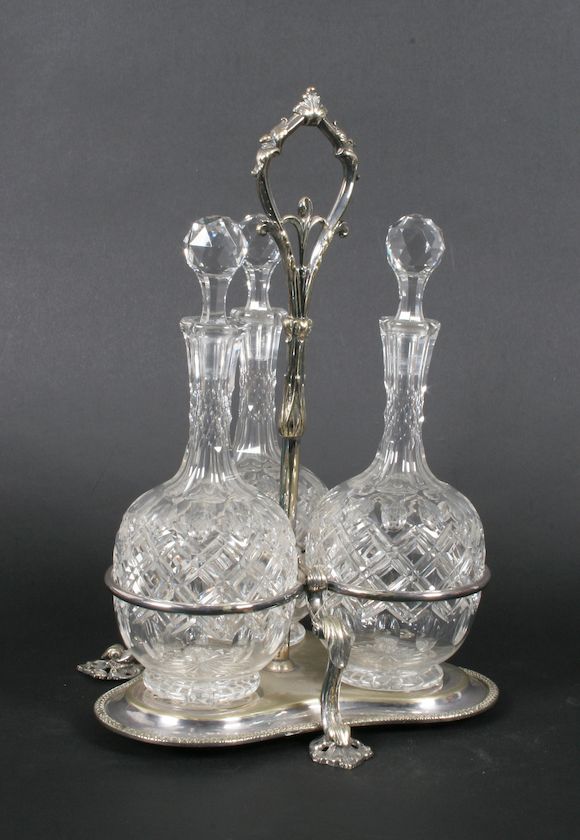 Bonhams : An electroplated decanter stand of trefoil design