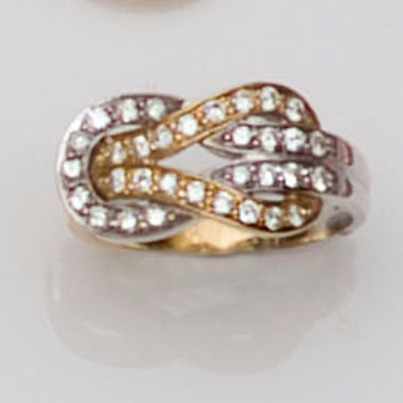 Bonhams : A two colour 18ct gold diamond set ring