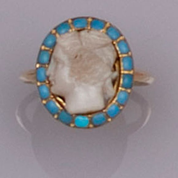 Bonhams : A gold and turquoise cameo ring,