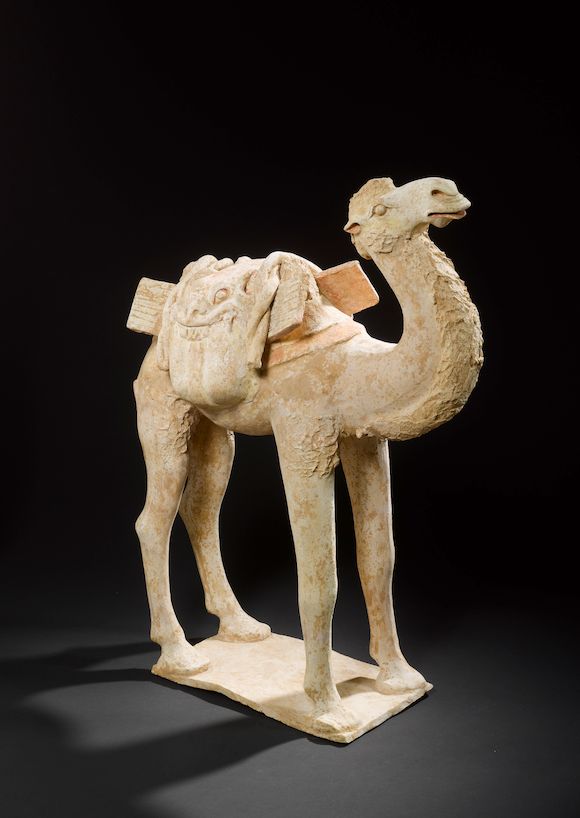 Bonhams : A large red pottery painted figure of a Bactrian camel Tang ...