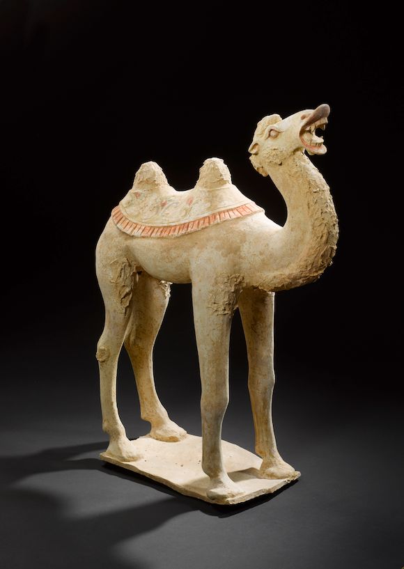 Bonhams : A large painted pottery figure of a Bactrian camel Tang Dynasty