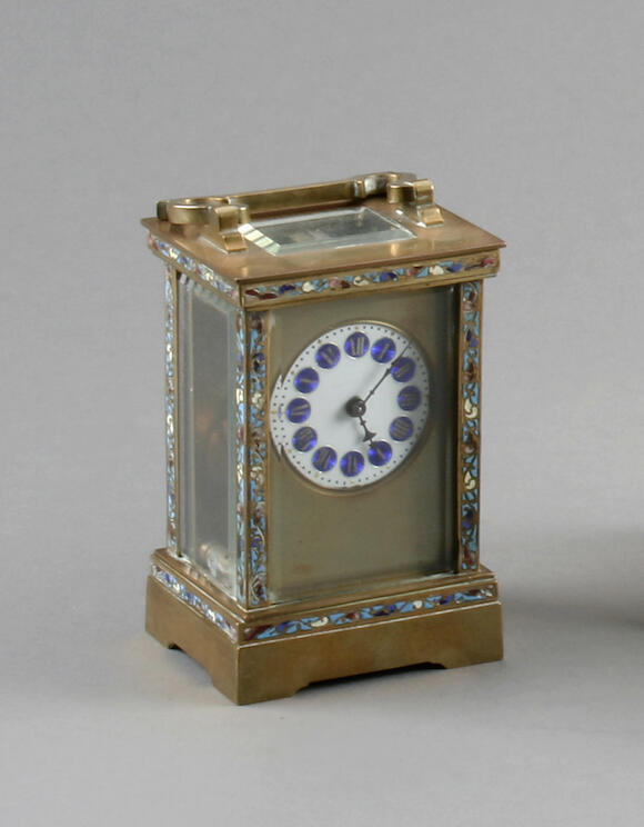 Bonhams : A late 19th Century brass and champleve enamel carriage timepiece sold with double ...