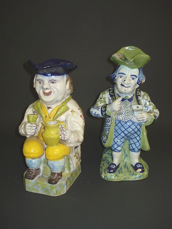 Bonhams : Two French faience Toby jugs, 19th Century