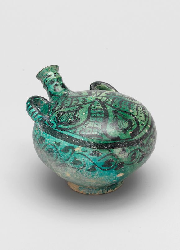 Bonhams : A Raqqa pottery Water Flask Syria, 12th/ 13th Century