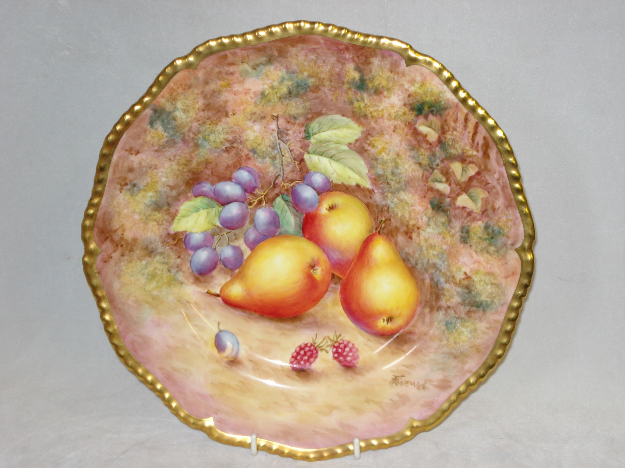 A Royal Worcester fruit painted plate by John Freeman, post-war ...