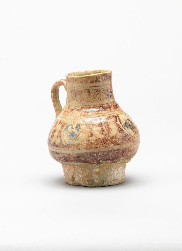 Bonhams : A Raqqa lustre pottery Jug Syria, 12th/ 13th Century