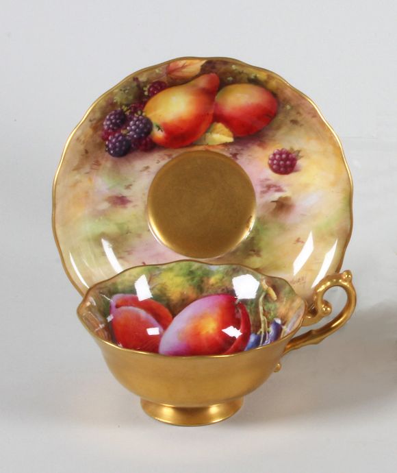 Bonhams : A Royal Worcester fruit painted cup and saucer by Hale and Moseley Dated 1926