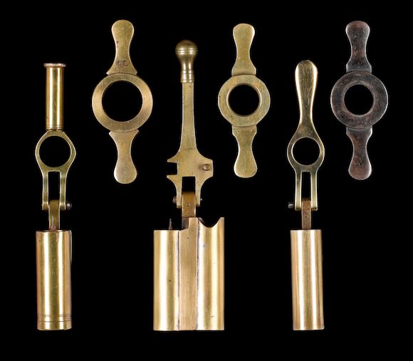 Bonhams : Nine hand-held capping/decapping tools for 12-bore cartridges ...