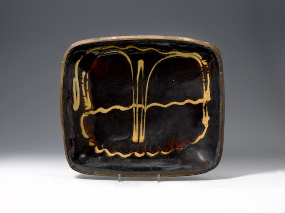 Bonhams : An English slipware dish mid 18th century