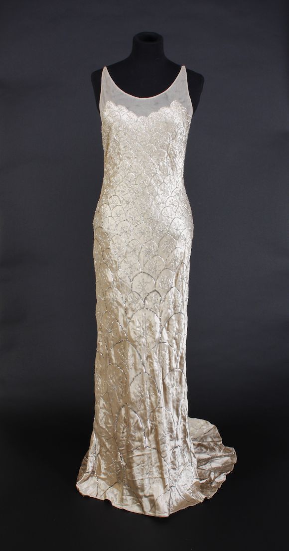 Bonhams : A 1930s cream satin beaded lady's evening dress