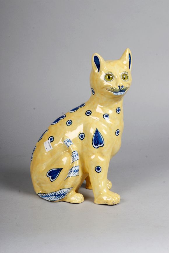 Bonhams : A French Masonic faience model of a seated cat