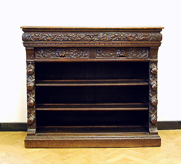 Bonhams : A late Victorian carved dark oak open bookcase
