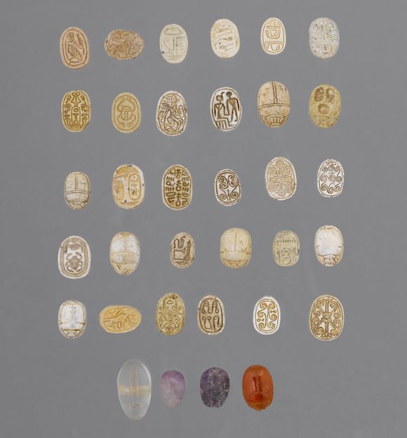 Bonhams : Four Egyptian hardstone scarabs and thirty Egyptian steatite ...